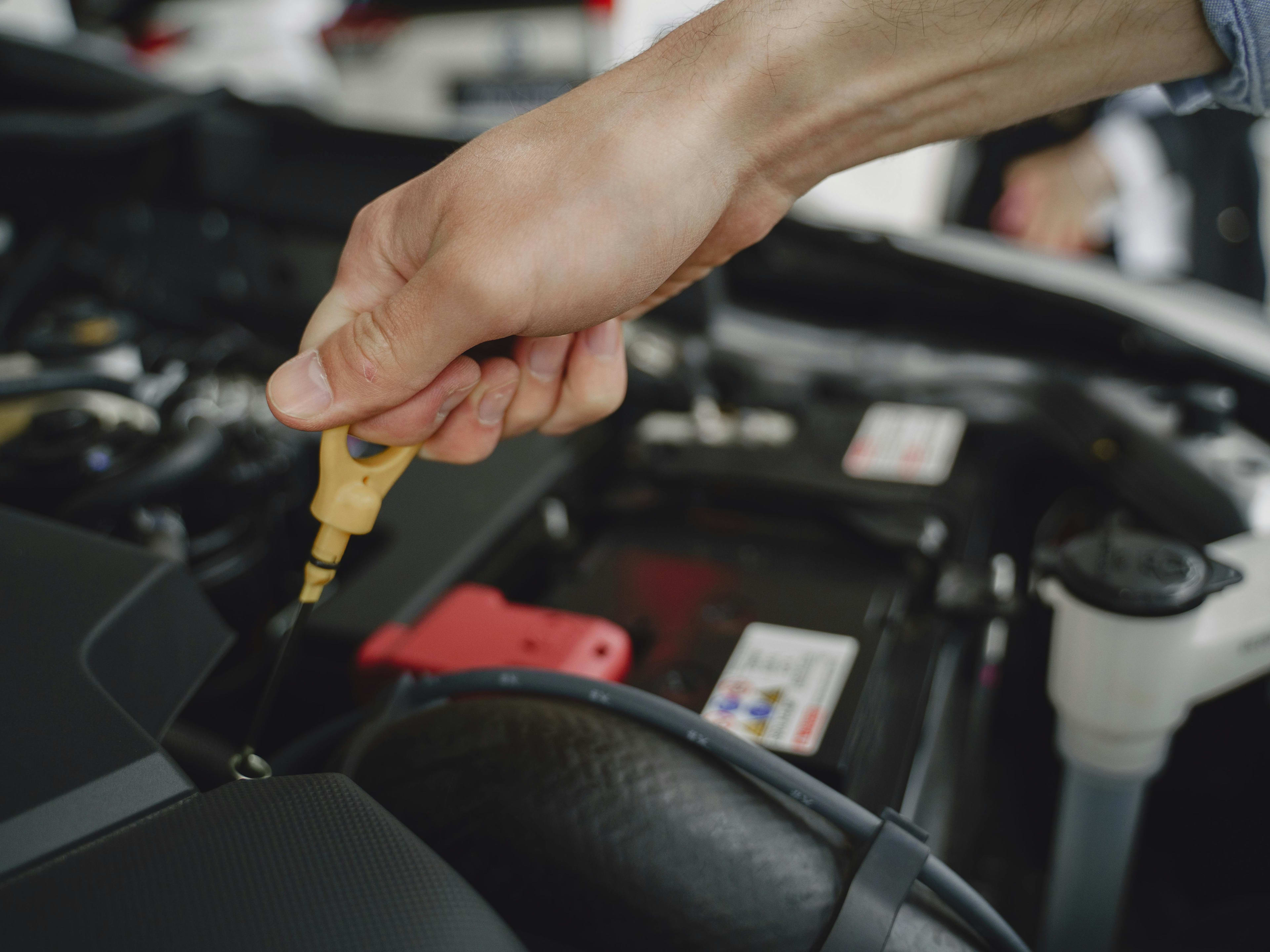 How to Check Engine Oil and Read a Dipstick Properly - AxleAddict