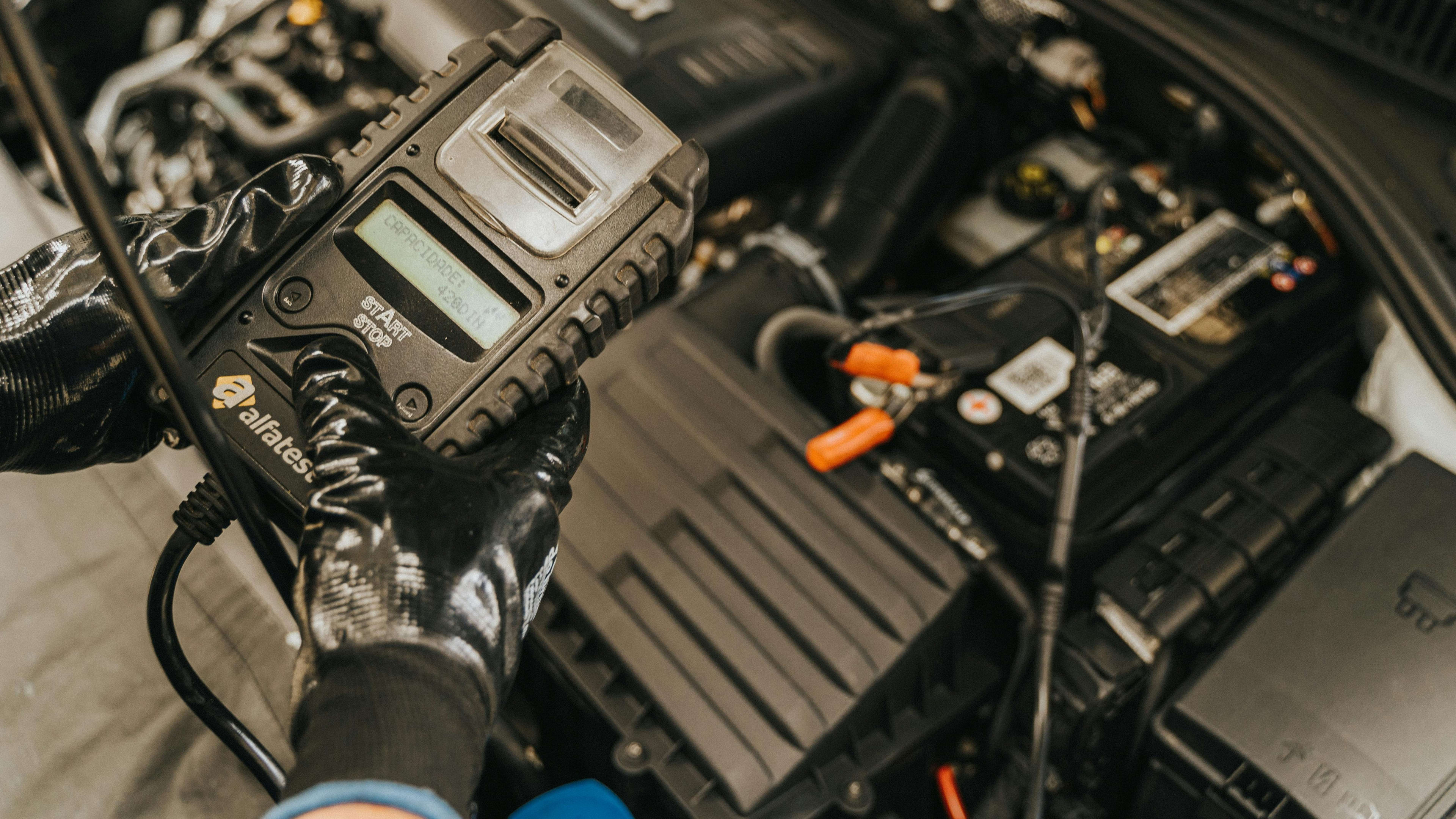 How to Safely Charge a Car Battery at Home - AxleAddict