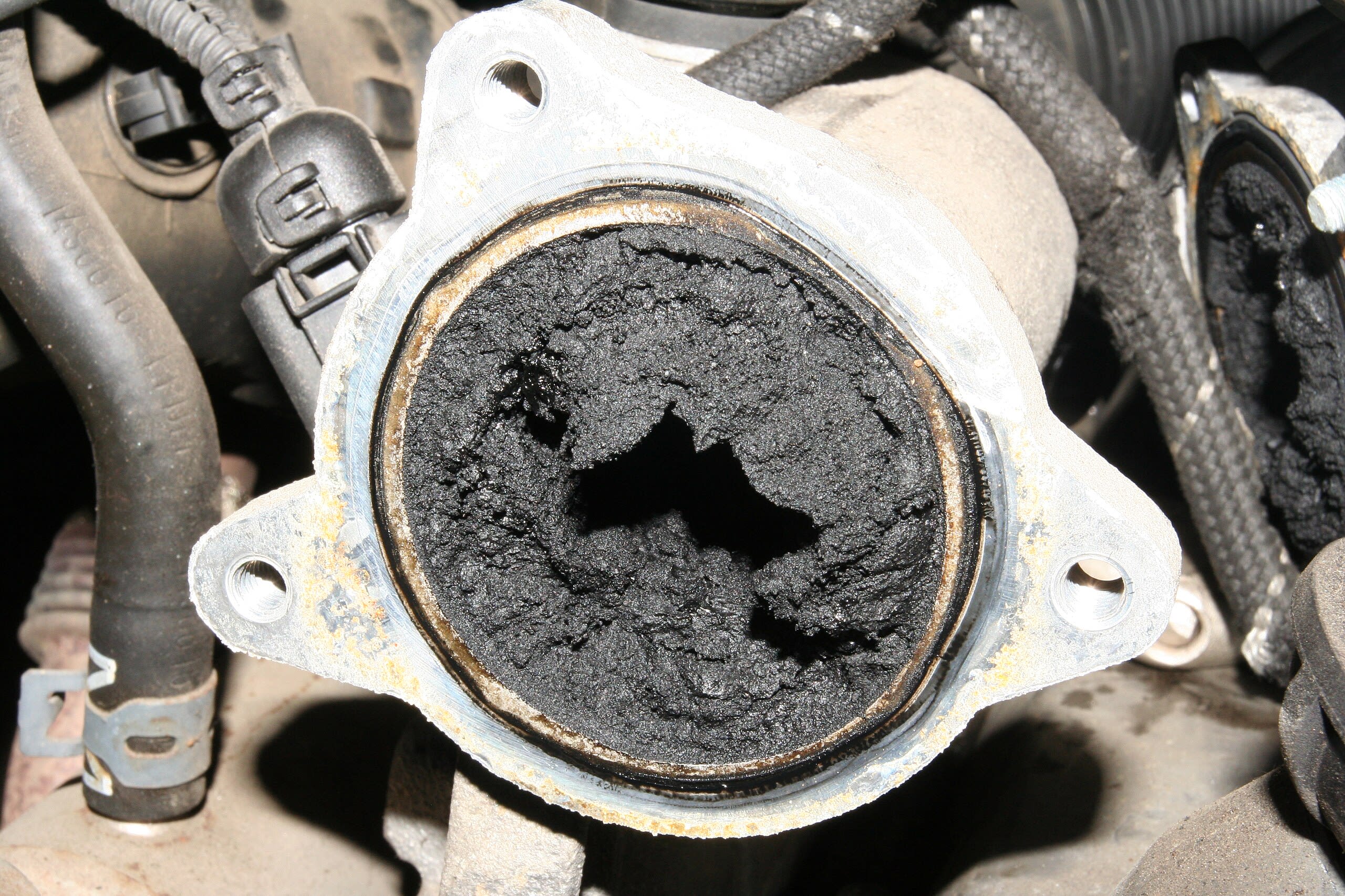 Learn the symptoms of a bad EGR valve before it's too late - AxleAddict