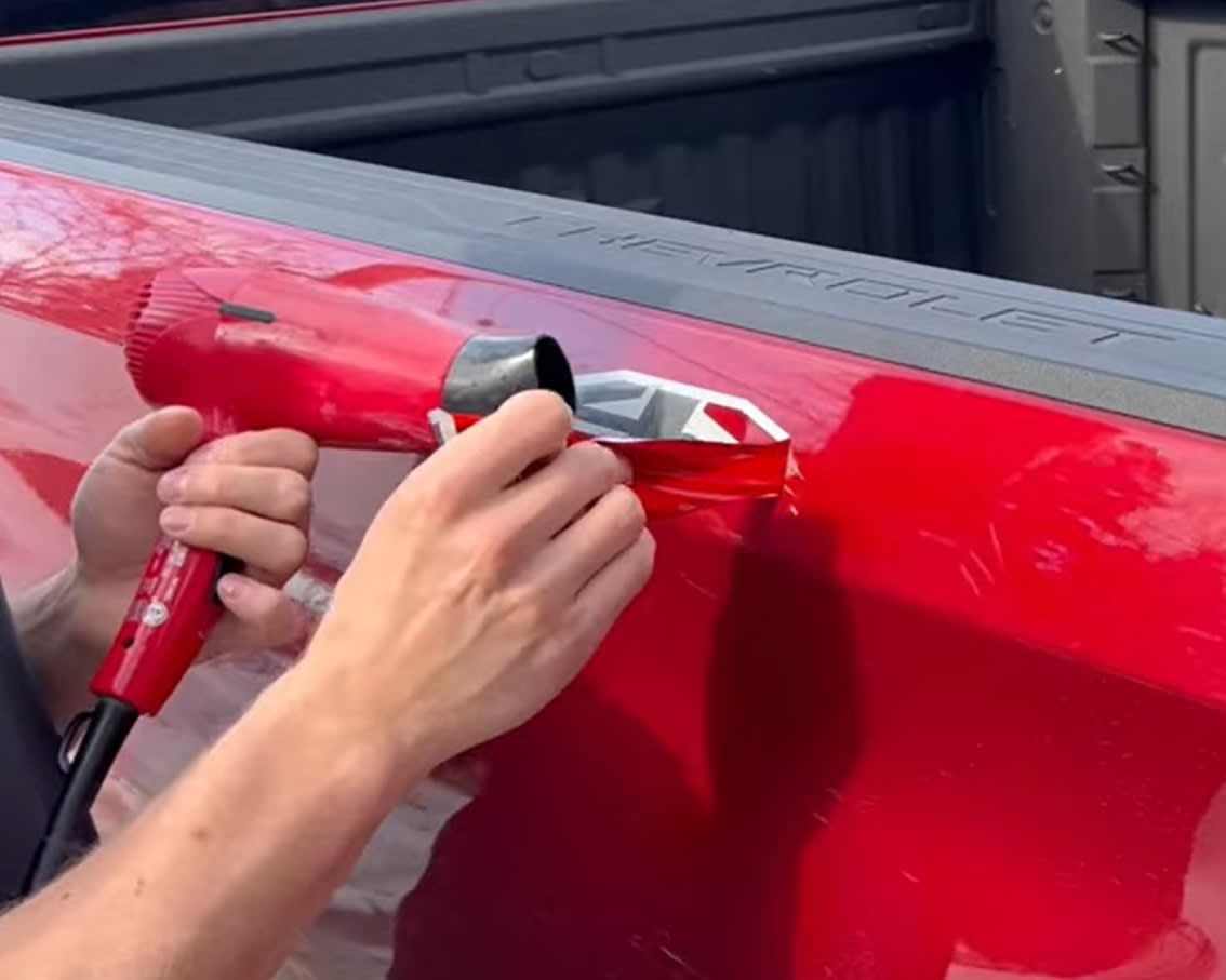 How to Remove Car Decals Safely Without Damaging Paint - AxleAddict