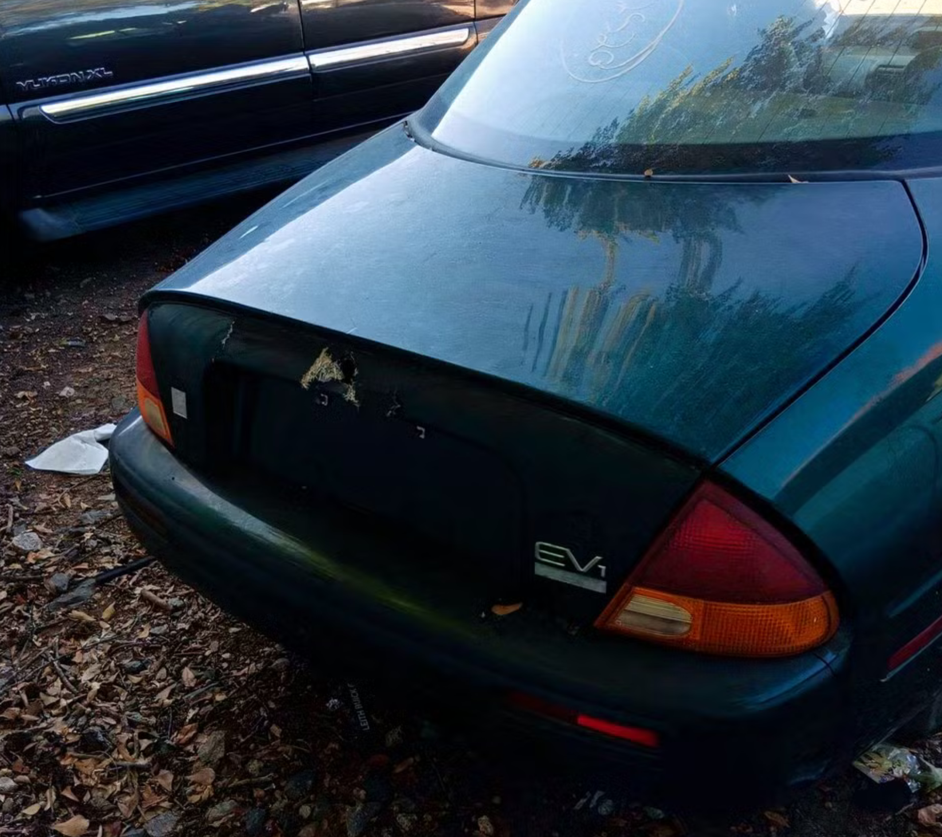 Ultra-Rare GM EV1 Sells for $104,000 Despite Poor Condition - AxleAddict